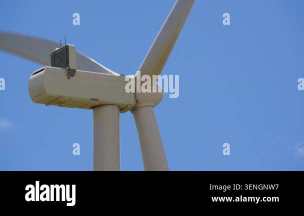 Close up view of clean energy wind turbine generator and rotating ...
