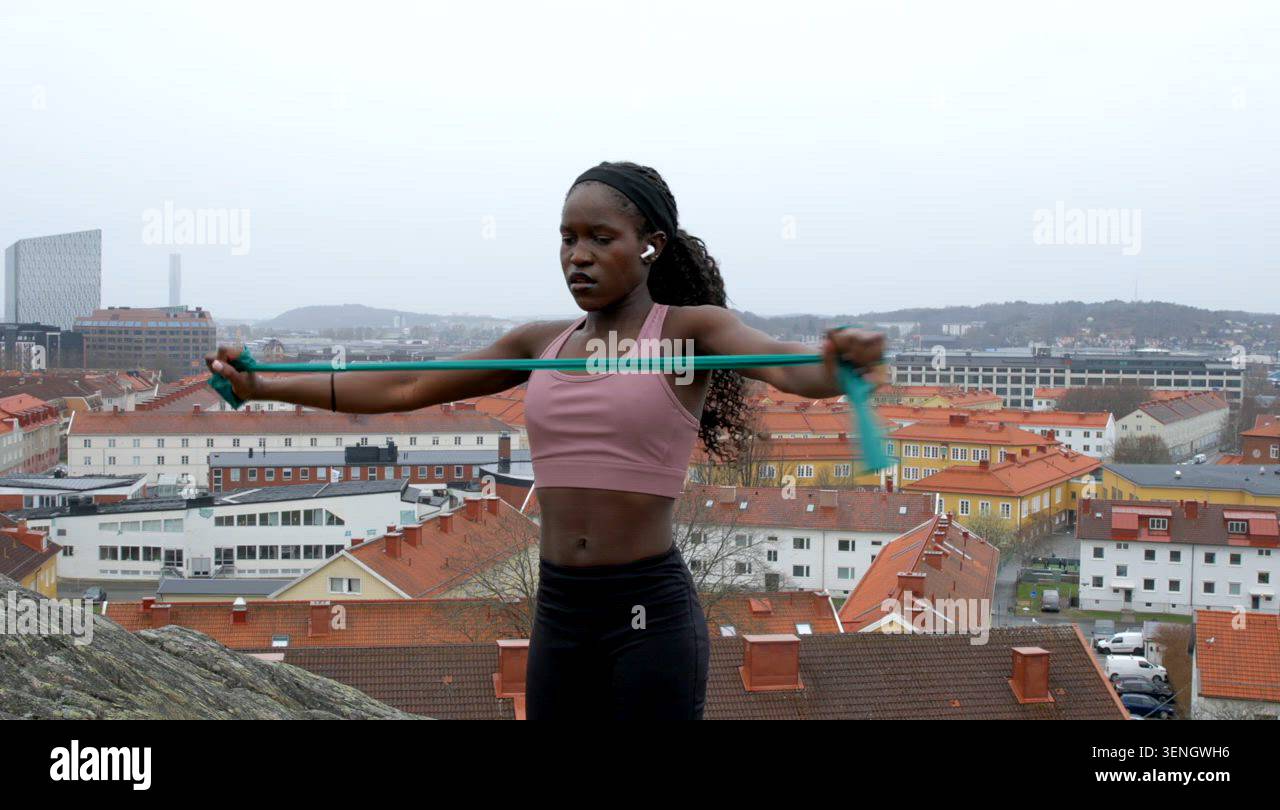 Young Black Woman Training with Resistance Band Stock Video Footage - Alamy