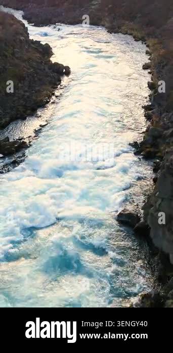 Epic Waterfall in scenic iceland nature, aerial shot - vertical video ...