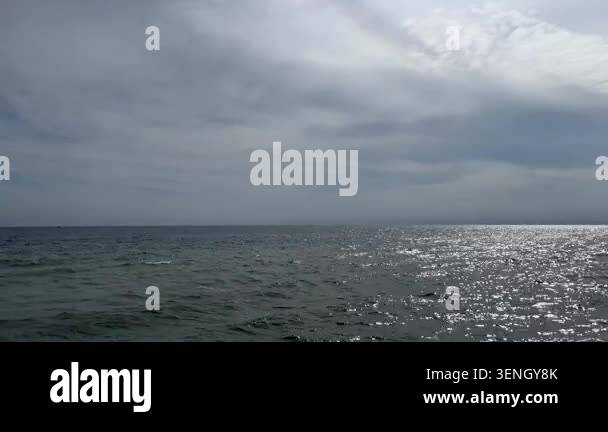 Tranquil beach surface sunlight Stock Video Footage - Alamy