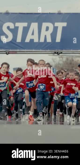 Chisinau, Moldova - June 1, 2026 Marathon. Children in red shirts ...