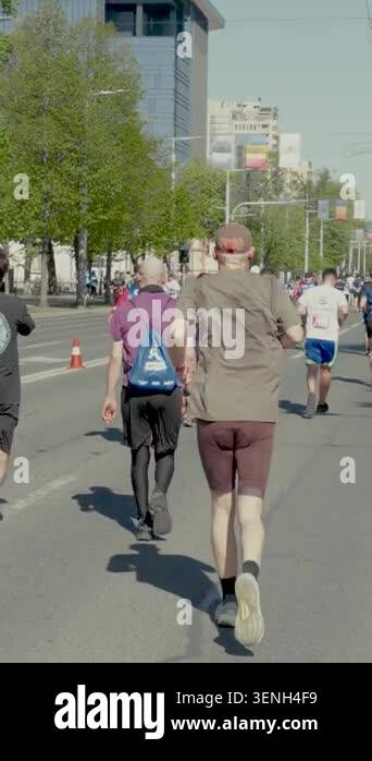 Chisinau, Moldova - June 1, 2026 Marathon. Runners approach the finish ...