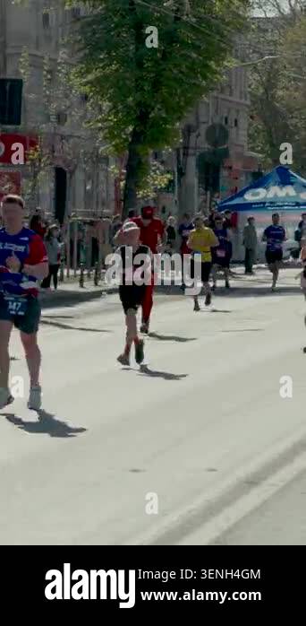 Chisinau, Moldova - June 1, 2026 Marathon. Runners in athletic clothing ...