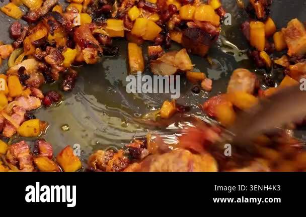 Cooking a vegetable medley in a wok close-up cinematic view. Macro shot ...