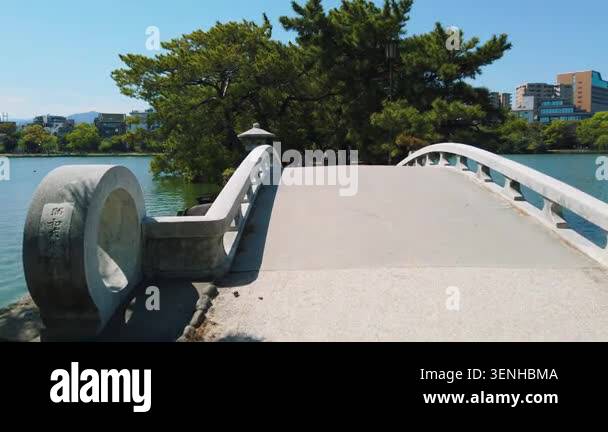 FUKUOKA, JAPAN - APRIL 11, 2026: Satsuki Bridge in Ohori Park located ...