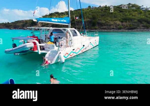 SAINT MARTIN - JANUARY 22, 2026: Drone view of tourists jumping from ...
