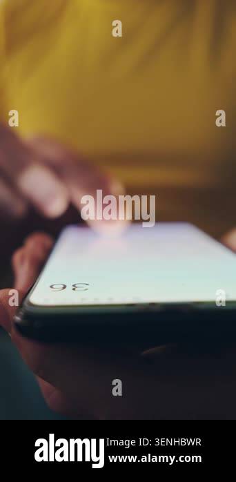 Man At Home Calculating Numbers On A Smartphone Calculator App Screen ...
