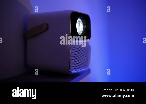 Smart Projector Casts A Colorful Film Onto The Wall While Switching On ...