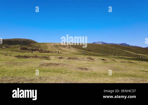 Wide shot of Kusasenri plateau at Mount Aso in Japan during spring ...