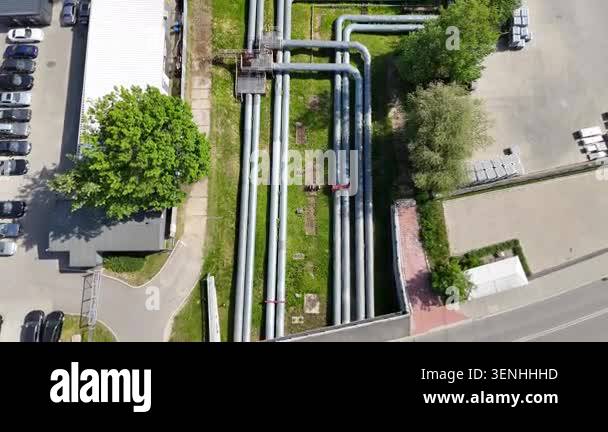 Aerial view of industrial pipes for gas, water, and oil running ...