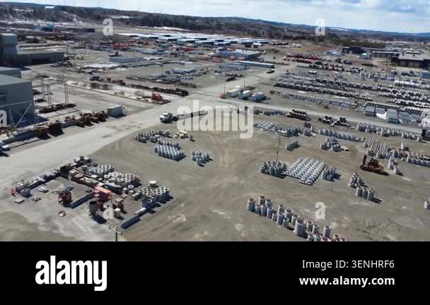 Industrial landscape in Matane, Quebec, featuring concrete pipe ...