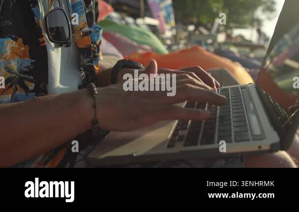 Close Up of a Digital Nomad Working on a Laptop at a Tropical Beach ...