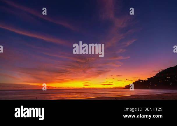 This tropical beach scene showcases a breathtaking sunset sky gradient ...