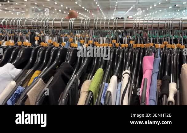 Clothing Rack With Assorted Fashion Garments in Busy Store Stock Video ...