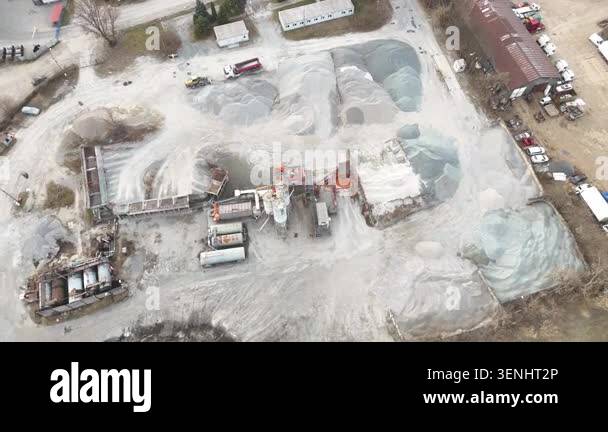 Aerial view of an industrial enterprise showing a gravel production ...