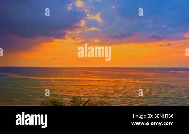 This tropical beach scene showcases a breathtaking sunset sky gradient ...