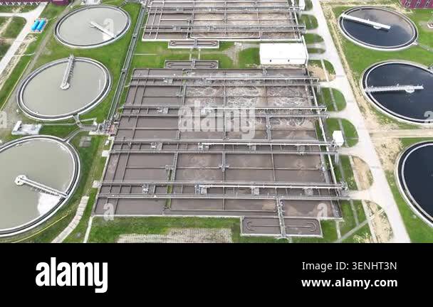 Aerial view of municipal wastewater treatment plant showing multiple ...