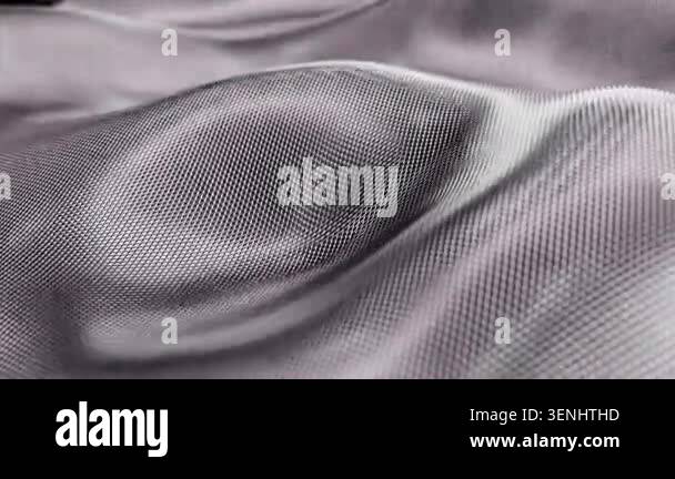 Abstract gray surface made of carbon fiber waving slowly, a perfect ...