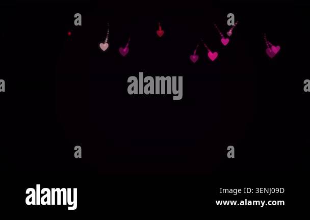 Small pink and red heart shapes floating on black background Stock ...