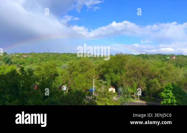 Beautiful rainbow appearing in the sky after storm Stock Video Footage ...