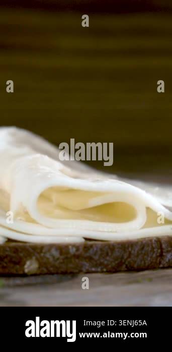 Super Slow Motion Macro Cheese Curl On Rye, Artisan Baker Arranging ...