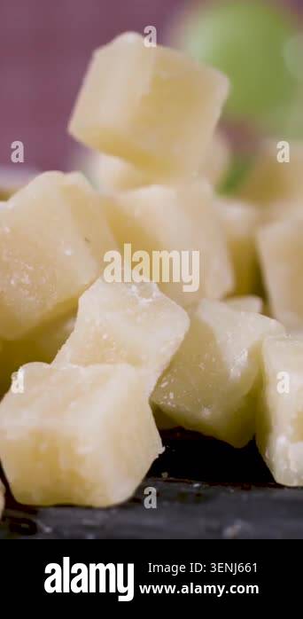Super Slow Motion Single Parmesan Cube Bouncing In Air Above Pile Stock ...
