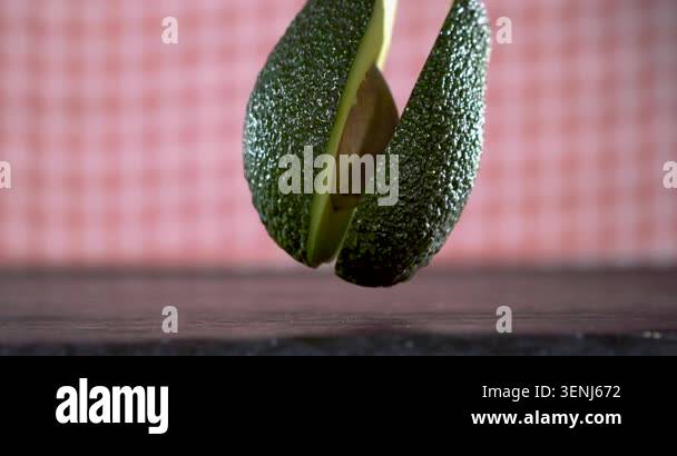 Super Slow Motion Levitating Avocado Halves Caught Mid Air Stock Video ...