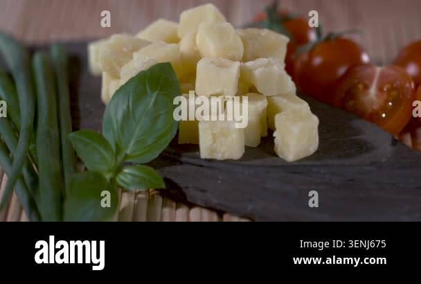 Super Slow Motion Cheese Cubes With Green Beans And Halved Cherry ...