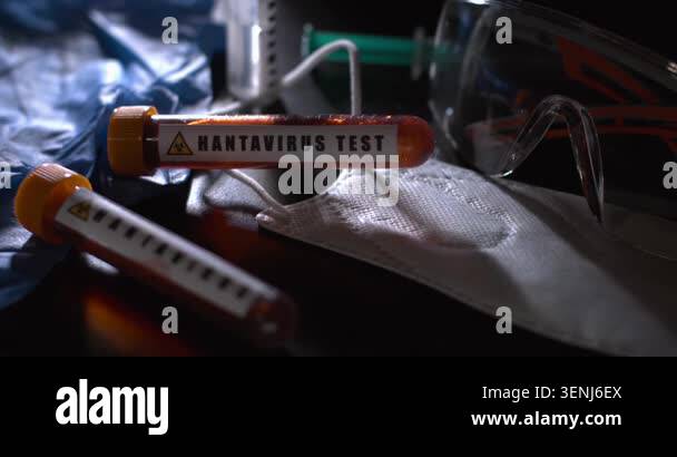 Super Slow Motion Closeup Hantavirus Test Vial On Mask, Super Slow ...