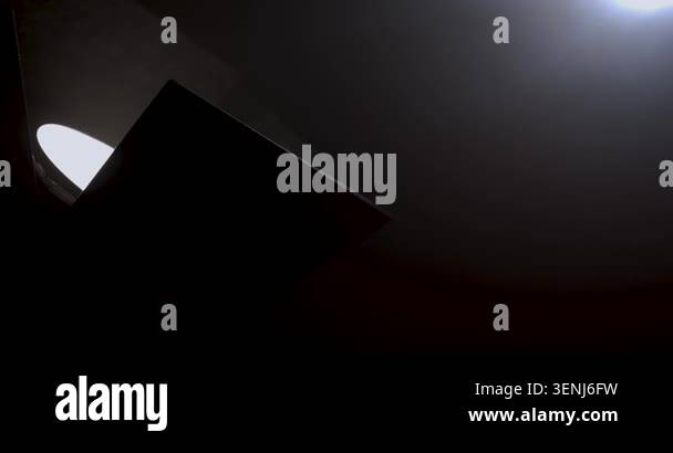Large Studio Lamp Peering Behind Tilted Set Piece, Strong Backlight ...