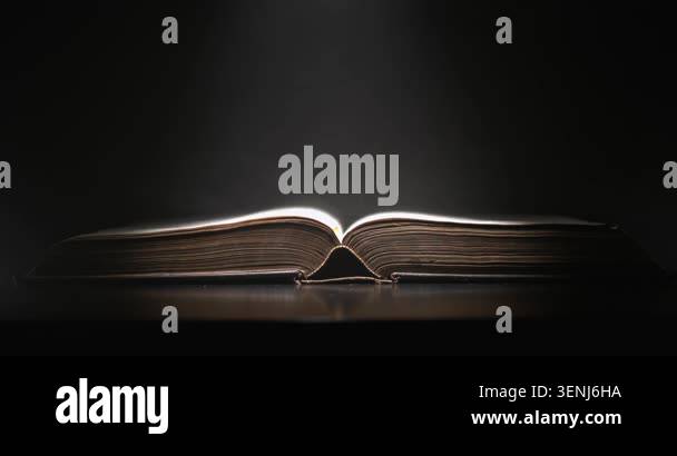 Antique Book Open Under Spotlight, Worn Pages And Textured Spine ...