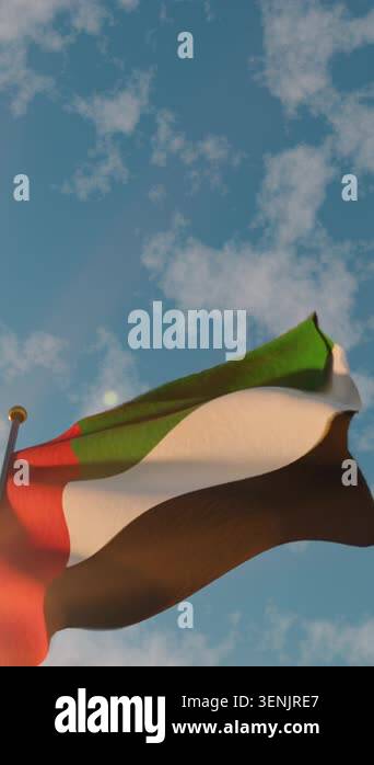 waving uae flag into the desert with blue sky background Stock Video ...