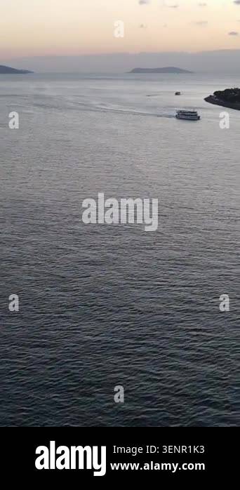 Aerial birds eye view of a ferryboat traveling in the Bosphorus sea, a ...