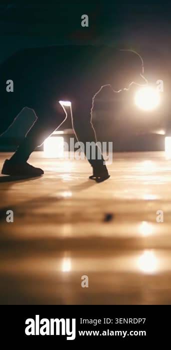Young man freerunner doing a series of jumps, somersaults and stunts ...