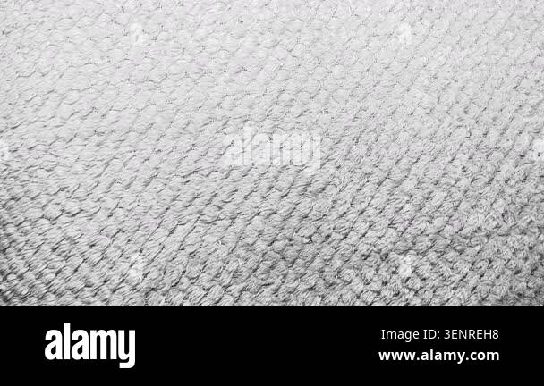 macro tracking shot reveals soft white cotton towel fabric texture with ...