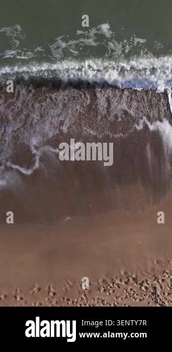 Aerial view of sandy beach and sea with waves, Top view, amazing nature ...
