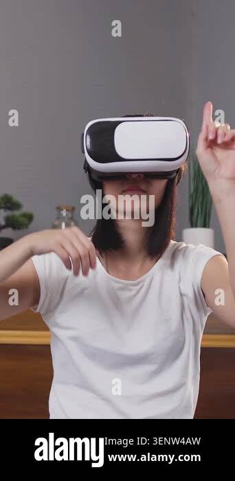 Good-looking confident 30-aged brunette working in virtual screen ...