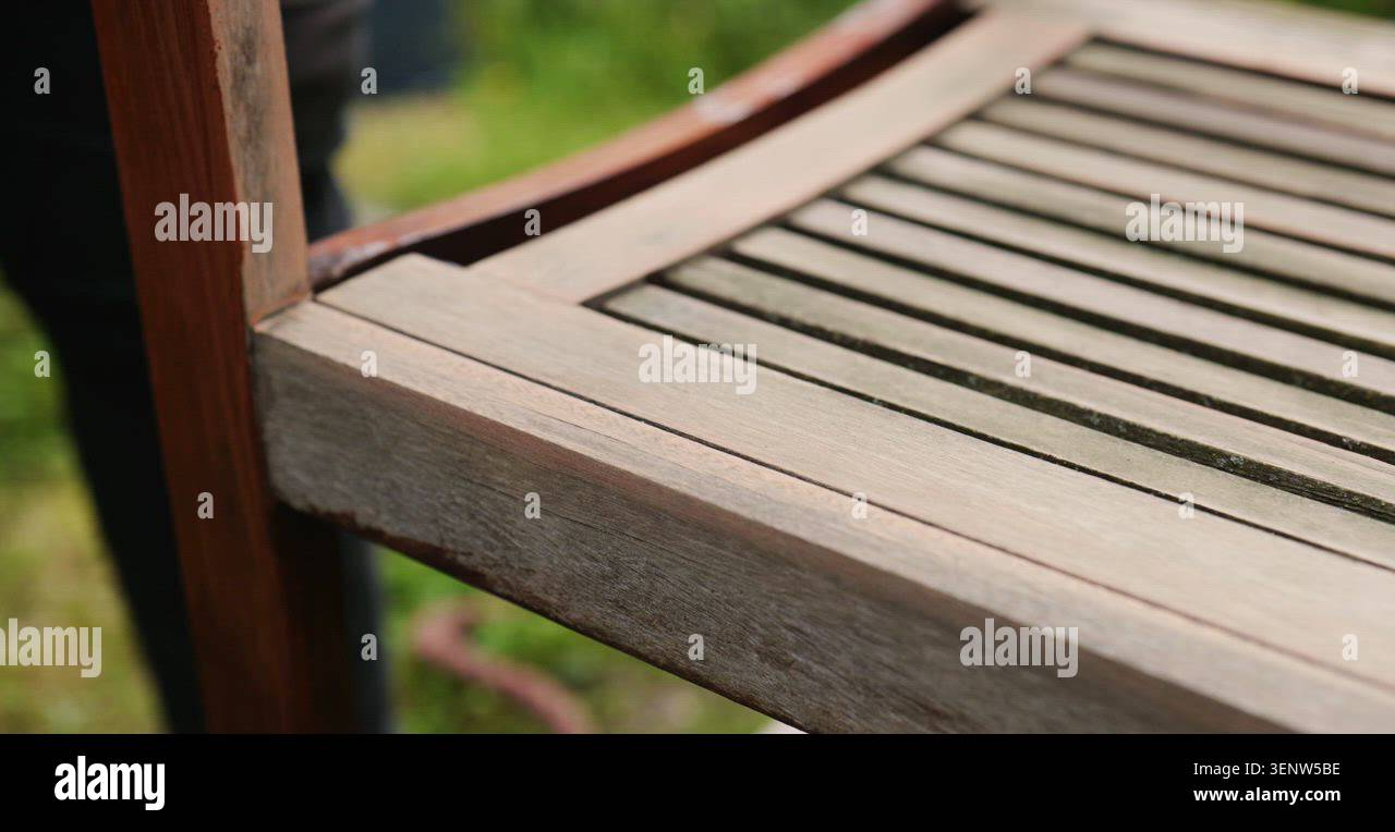 Painting garden bench Stock Video Footage - Alamy