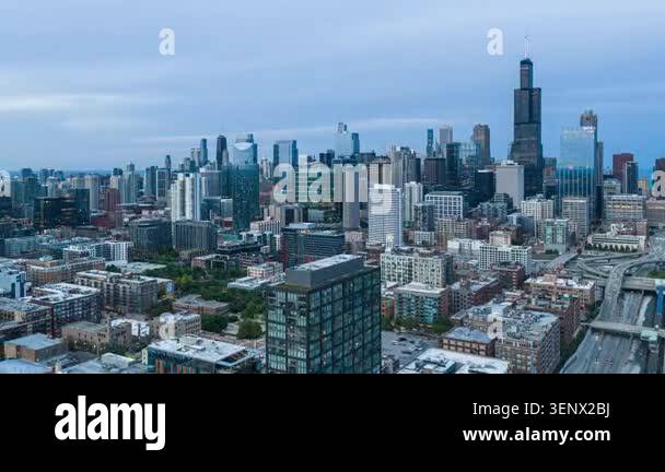 Chicago downtown skyline transitioning from afternoon to twilight ...