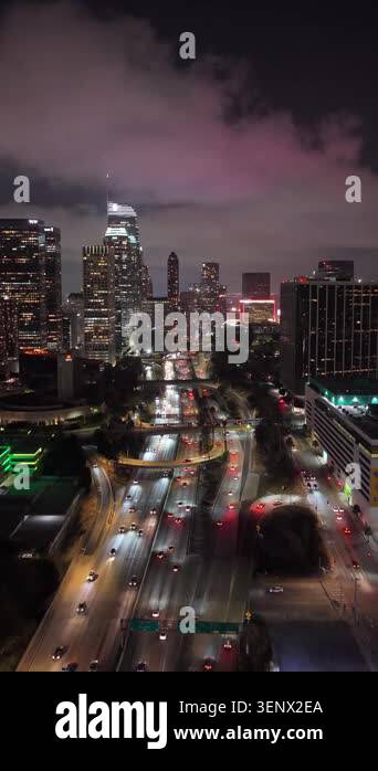 Overcast evening over downtown Los Angeles with heavy traffic on Harbor ...