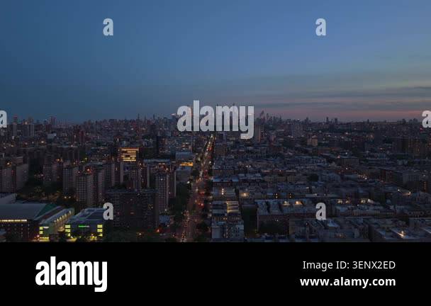 South Bronx showing streets illuminated by traffic at twilight with ...