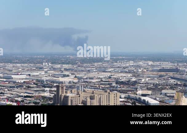 Air pollution from industrial fire showing thick black smoke rising ...