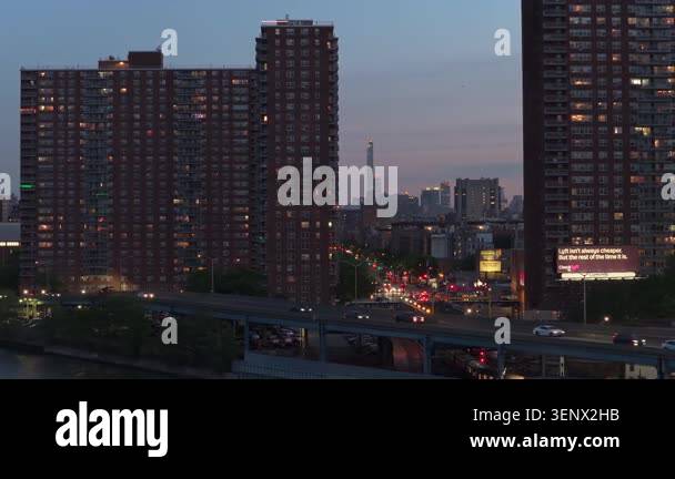 South Bronx apartment buildings and busy overpass at twilight with ...