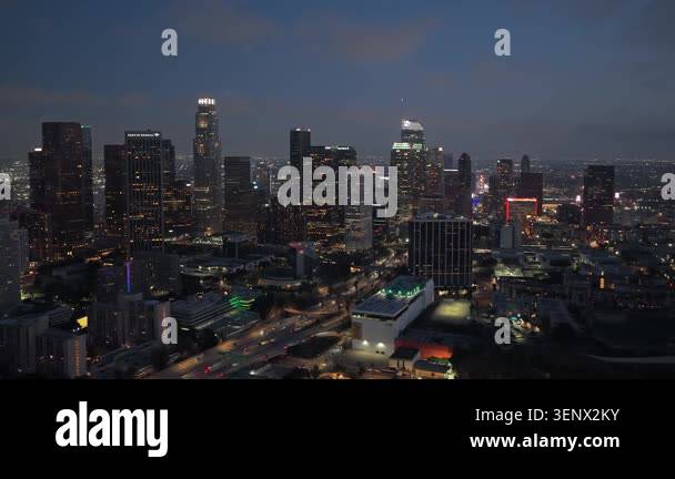 Downtown Los Angeles cityscape illuminating skyscrapers and urban ...
