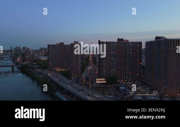 South Bronx, New York at twilight with Harlem River and Major Deegan ...