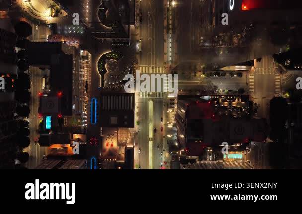 Top down aerial shot flying above downtown Los Angeles city streets ...