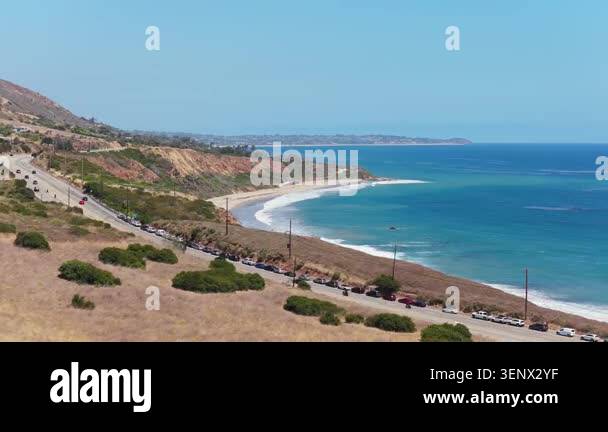 Scenic Pacific Coast Highway in Malibu with cars driving along pristine ...