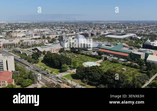 Cinematic orbit showcasing Exposition Park in Los Angeles with ...