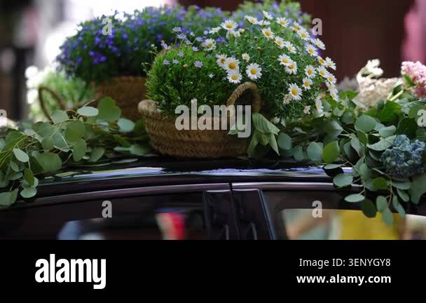 Bridal limousine decorated with fresh flower arrangements. Beautiful ...