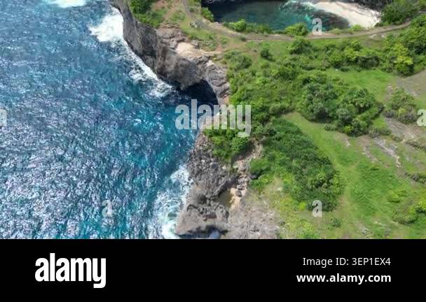 Aerial view of amazing rocky arch and blue sea water on Broken beach in ...